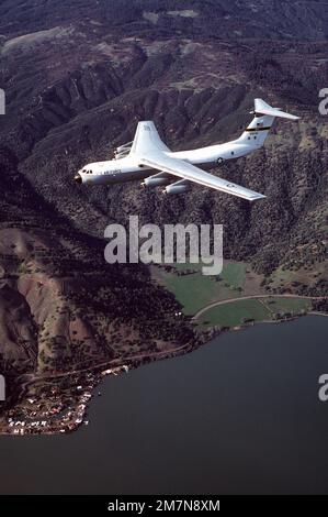 A C-141 Starlifter from the 710th Military Airlift Squadron, 60th ...