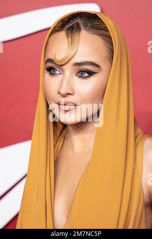 Sabrina Carpenter poses for photographers upon arrival at the British Fashion Awards in London ...