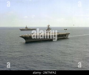 A port view of the stern of the nuclear-powered aircraft carrier USS ...