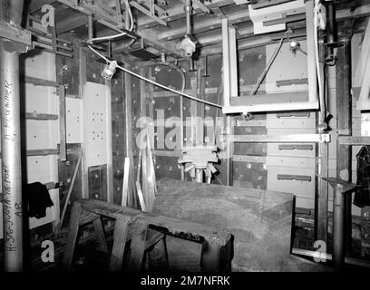 An interior view of the combat information center on the guided missile ...