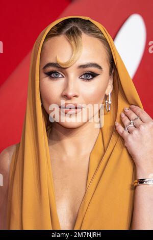 Sabrina Carpenter poses for photographers upon arrival at the British Fashion Awards in London ...