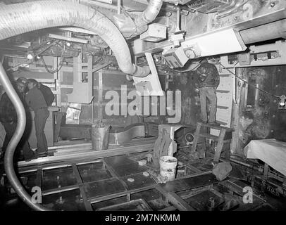 An interior view of combat information center, radar and IFF spaces on ...