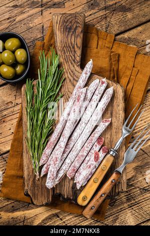 Dry salami mini sausage snack appetizer Stock Photo - Alamy