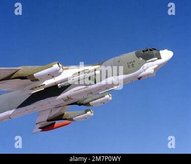 An air-to-air right side view of a B-52 Stratofortress aircraft from ...