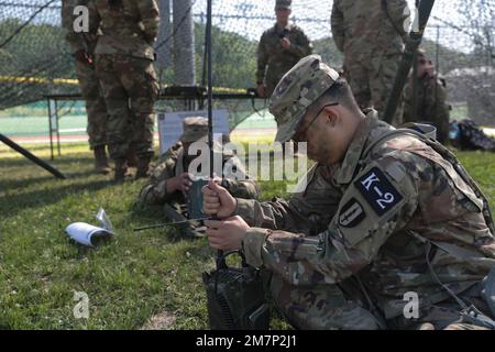 A Korean Augmentation to the U.S. Army Soldier competes in a Gen. Paik ...
