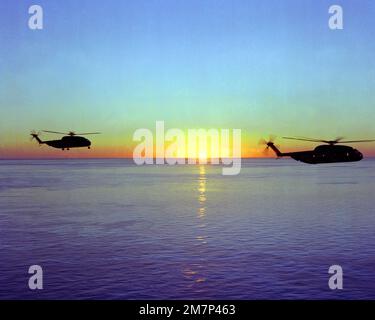 A right side view of an H-53 Sea Stallion helicopter on the flight deck ...
