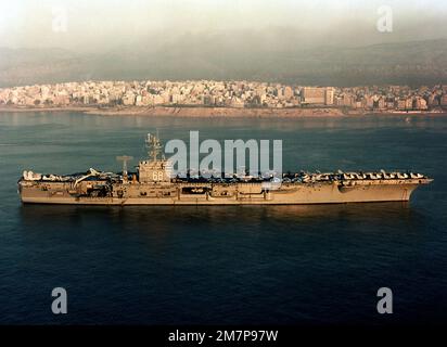 A starboard beam view of the nuclear-powered aircraft carrier USS ...