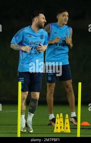 Argentina's Lionel Messi (left) and Nahuel Molina celebrate following ...