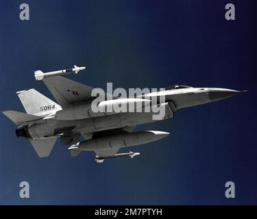 An underside view of an F-16A Fighting Falcon aircraft carrying Low ...