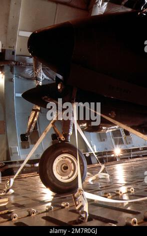 A U-21 Beechcraft King Air A100 aircraft is ready to be loaded aboard a ...