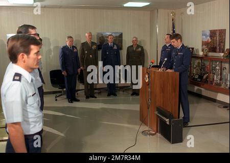 Lieutenant General Edward Bronars, left, presents the Meritorious Unit ...