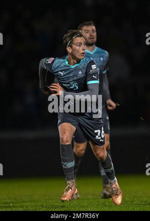 Plymouth Argyle midfielder Callum Wright (26) walks on and inspect the ...