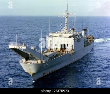 An aerial port bow view of the tank landing ship USS FAIRFAX COUNTY ...