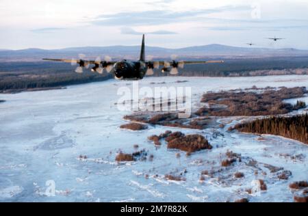 A left front view of an AC-130A Hercules aircraft as it taxis out. Five ...