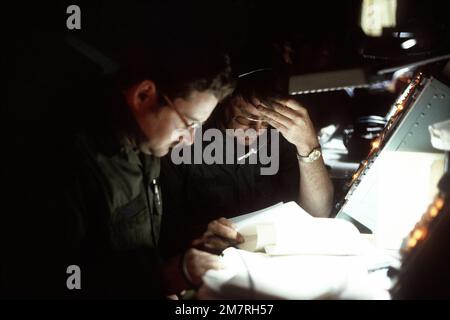 Members of the 6948th Electronic Security Command work on a radar site ...