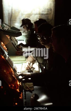 Members of the 6948th Electronic Security Command work on a radar site ...