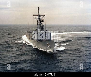An aerial starboard bow view of the Oliver Hazard Perry class guided ...