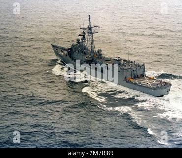 Aerial port quarter view of the Oliver Hazard Perry class guided ...