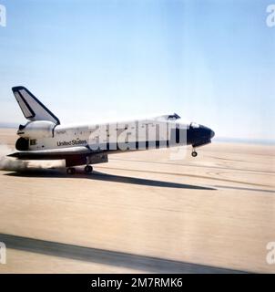 A front view of the Columbia space shuttle orbiter landing. Base ...