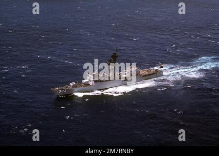 A port bow view of the frigate USS ROARK (FF-1053) underway en route to ...