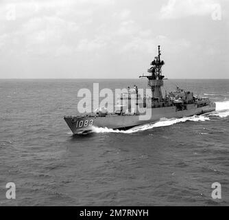 The frigate USS COOK (FF-1083) is moored alongside the fast combat ...
