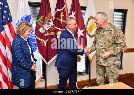 The Honorable Gilbert Cisneros Jr., center right, Under Secretary of ...