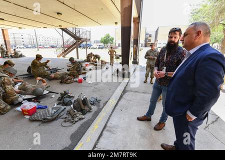 The Honorable Gilbert Cisneros Jr., center right, Under Secretary of ...