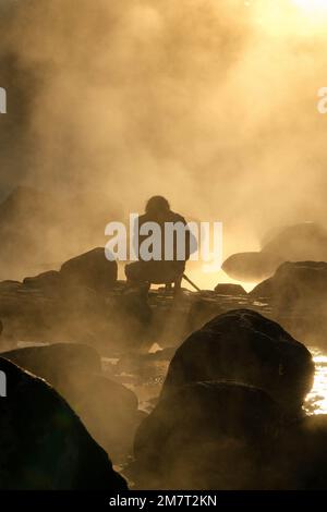 January 8, 2023; Hot springs and fog in Thailand with morning sunlight ...