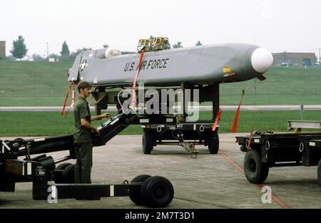 The missile crew from the 416th Bomb Wing, transports an Air-Launched ...