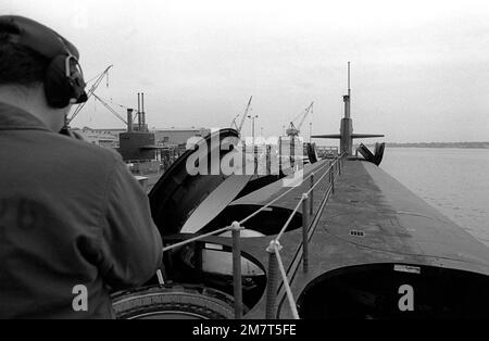 A deck view, looking toward the bow, of the nuclear-powered fleet ...