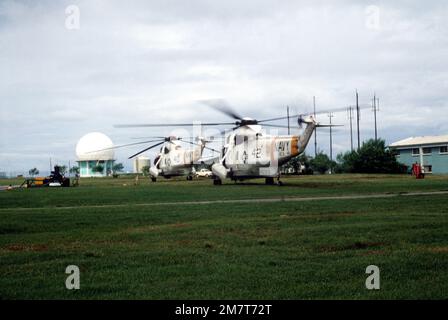 Two Fleet Composite Squadron 5 (VC-5) A-4E Skyhawk aircraft fly over ...