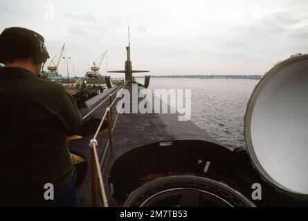 A deck view, looking toward the bow, of the nuclear-powered fleet ...