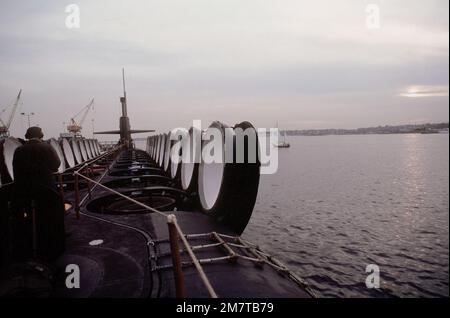 A deck view, looking toward the bow, of the nuclear-powered fleet ...