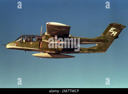 An air-to-air left side view of an OV-10 Bronco aircraft in use during ...