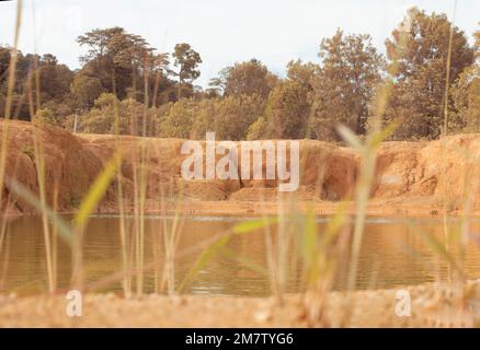 nearby lake around the barren or dried land Stock Photo - Alamy