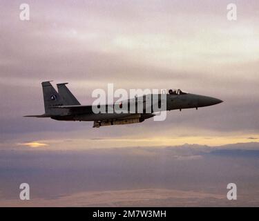 Right side view of an F-15 Eagle aircraft taking off. The aircraft is ...