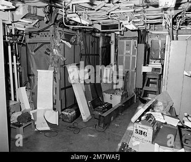 An interior view of the combat information center on the guided missile ...