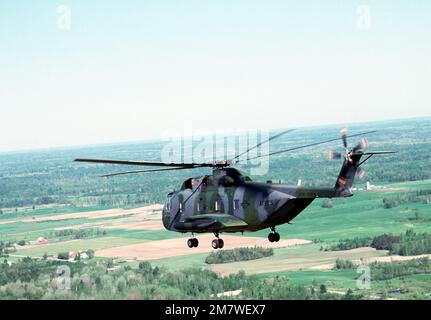 A left rear view of an HH-3E helicopter assigned to the 33rd Aerospace ...