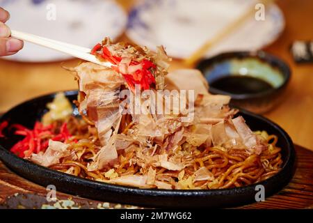 Yakisoba with katsuobushi on a plate Stock Photo - Alamy
