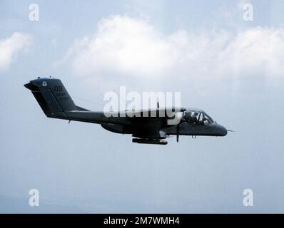 An air-to-air left side view of an OV-10 Bronco aircraft in use during ...