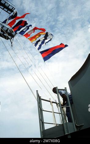 A signalman aboard the nuclear-powered aircraft carrier USS ABRAHAM ...