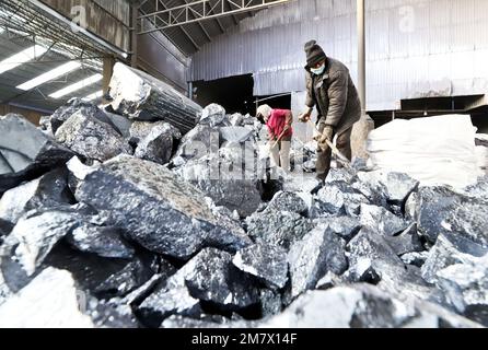 ZHANGYE, CHINA - JANUARY 10, 2023 - A smelting worker observes the ...