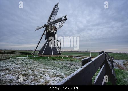 Mellemolen, dutch windmill in Akkrum, the Netherlands. In the winter ...