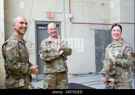Maj. Gen. Bret Larson, commander of the 22nd Air Force, receives a ...