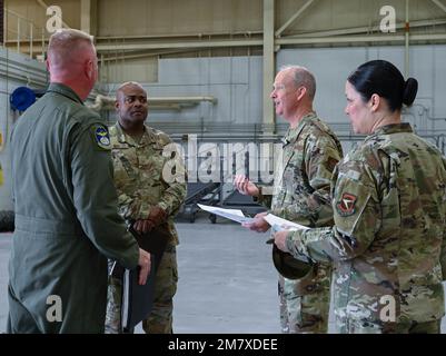 Maj. Gen. Bret Larson, commander of the 22nd Air Force, receives a ...