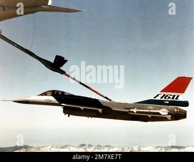 An F-16XL Fighting Falcon aircraft, armed with AIM-9 Sidewinder and AIM ...