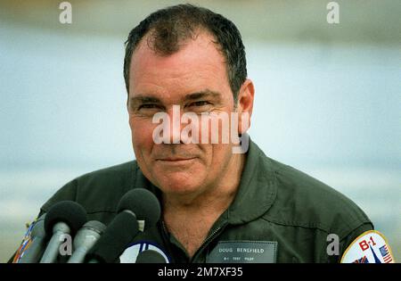 Rockwell test pilot Doug Benefield steps down the exit ladder of a B-1 ...