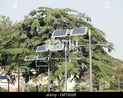 A solar panel, a device that converts sunlight into electricity by ...