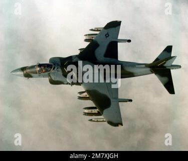 A view of an AV-8B Harrier aircraft with a camouflage paint scheme, as ...