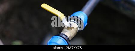 Closeup of pvc pipes with tap or faucet Stock Photo - Alamy